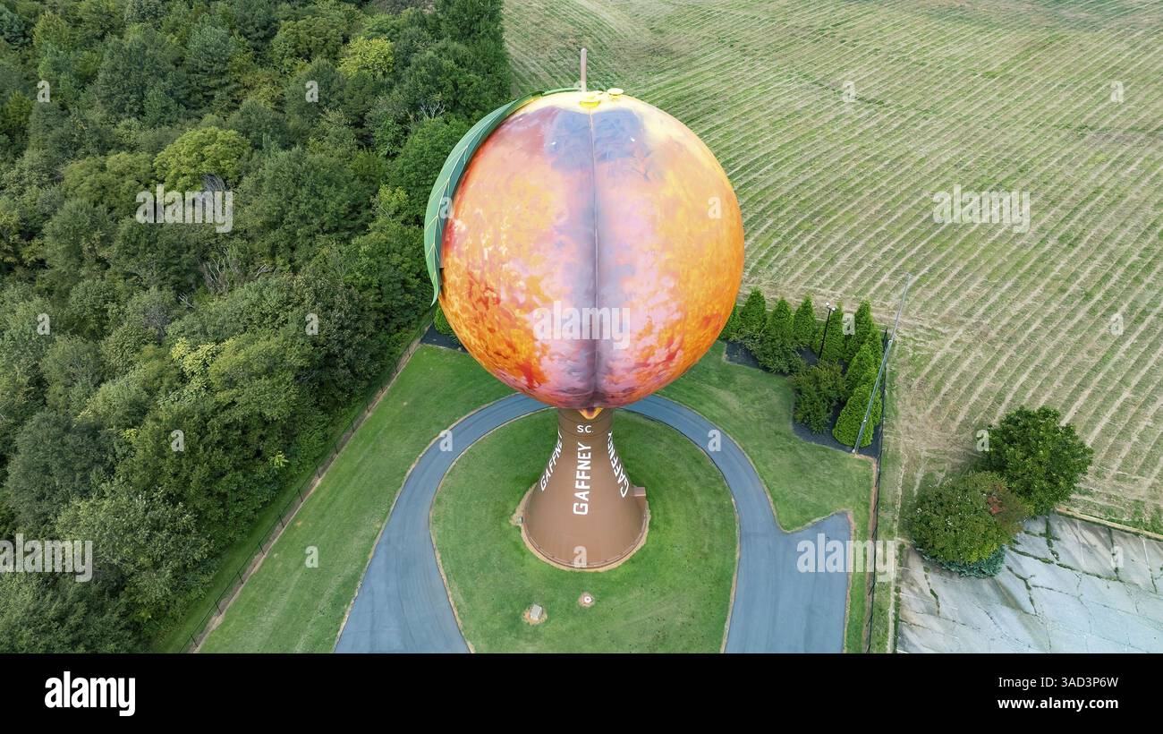 The Peachoid, a 135-foot water tower in Gaffney, SC, resembles a peach ...