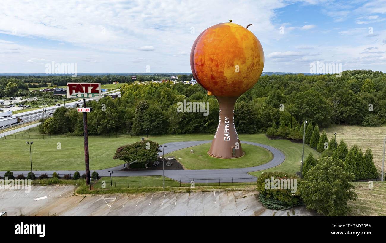 The Peachoid, a 135-foot water tower in Gaffney, SC, resembles a peach ...
