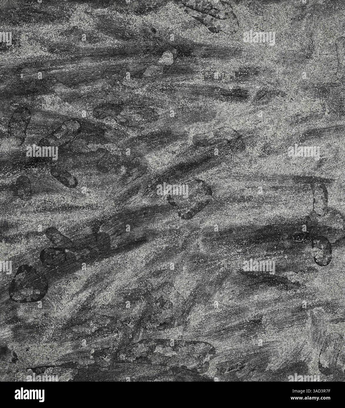 Abstract gray background displaying chalkboard texture with smudged ...