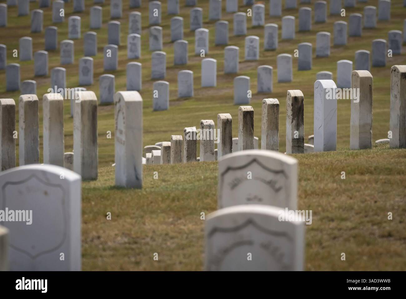 Generic views of a veterans cemetery on a serene day, featuring ...