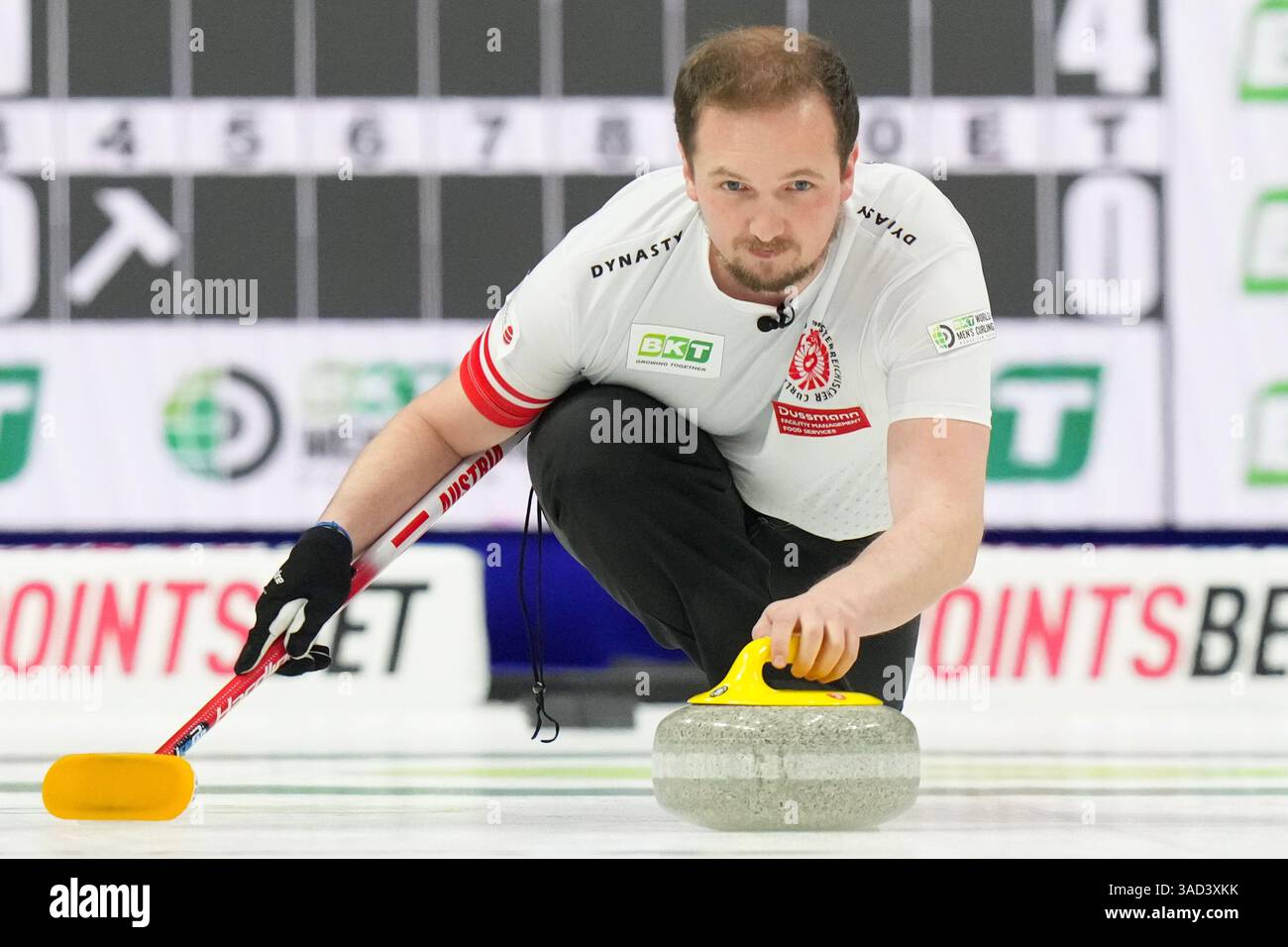 Moose Jaw, Can. 04th Apr, 2025. Austria's skip Mathias Genner throws a ...