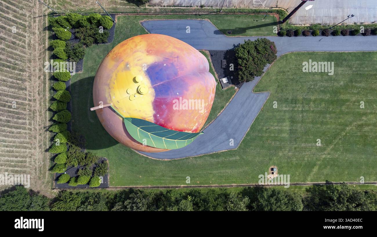 The Peachoid, a 135-foot water tower in Gaffney, SC, resembles a peach ...