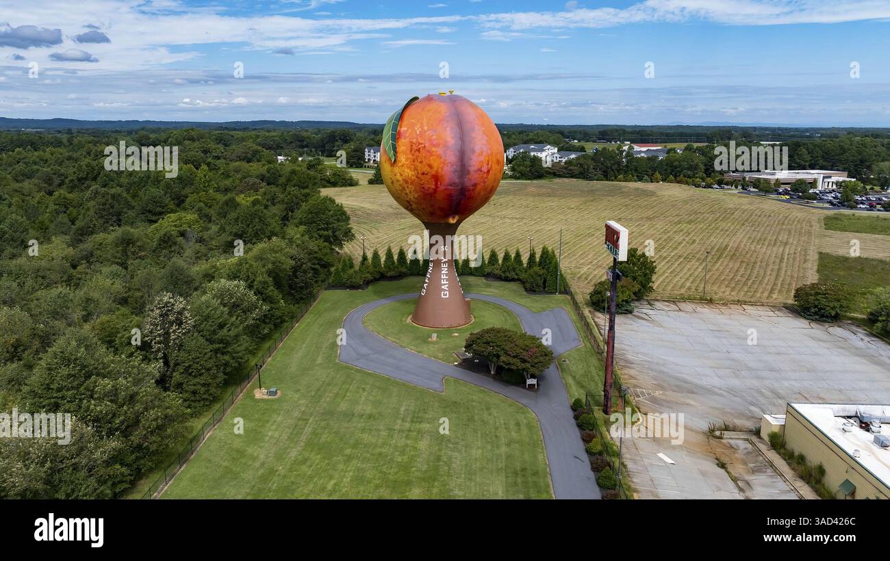The Peachoid, a 135-foot water tower in Gaffney, SC, resembles a peach ...