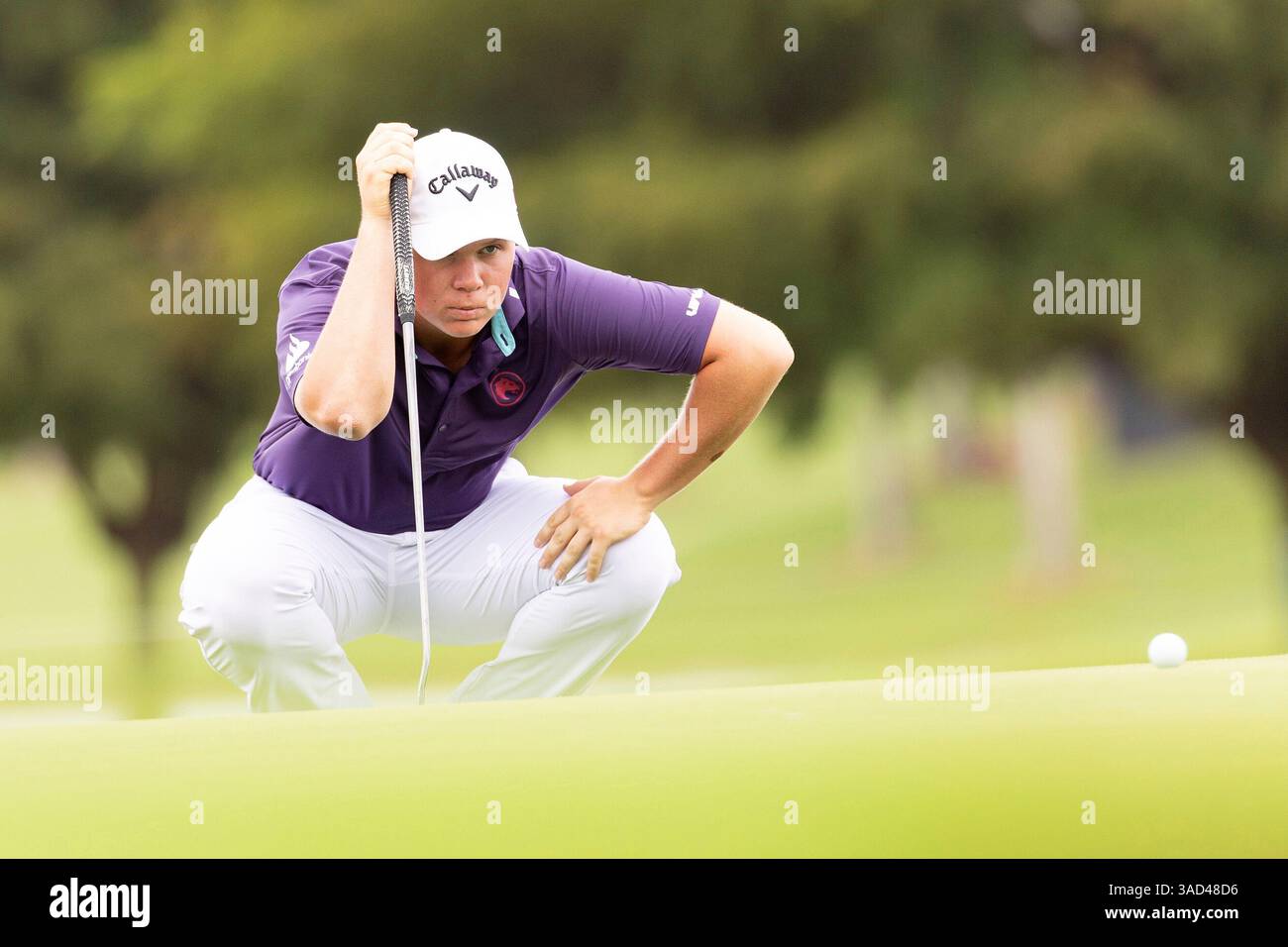 Caleb Surratt of Legion XIII lines up a putt on the fourth green during ...