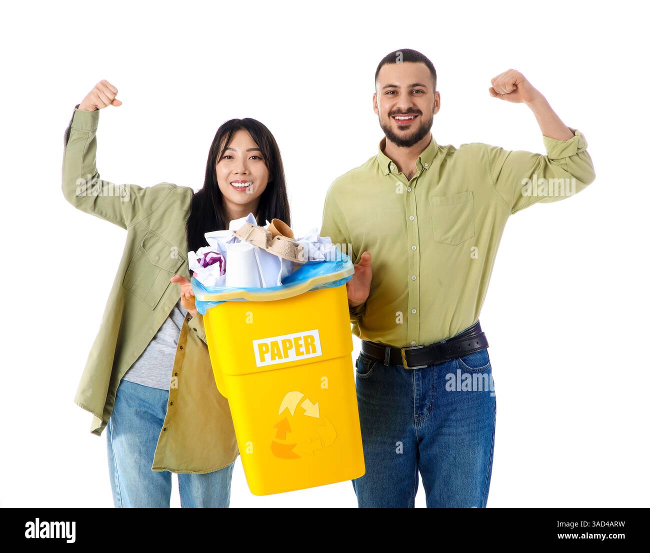 Young couple with sorted rubbish in garbage bin showing muscles on ...