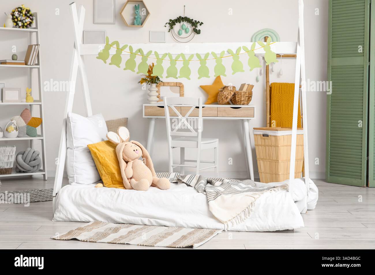Interior of children's room decorated for Easter with bed and study ...