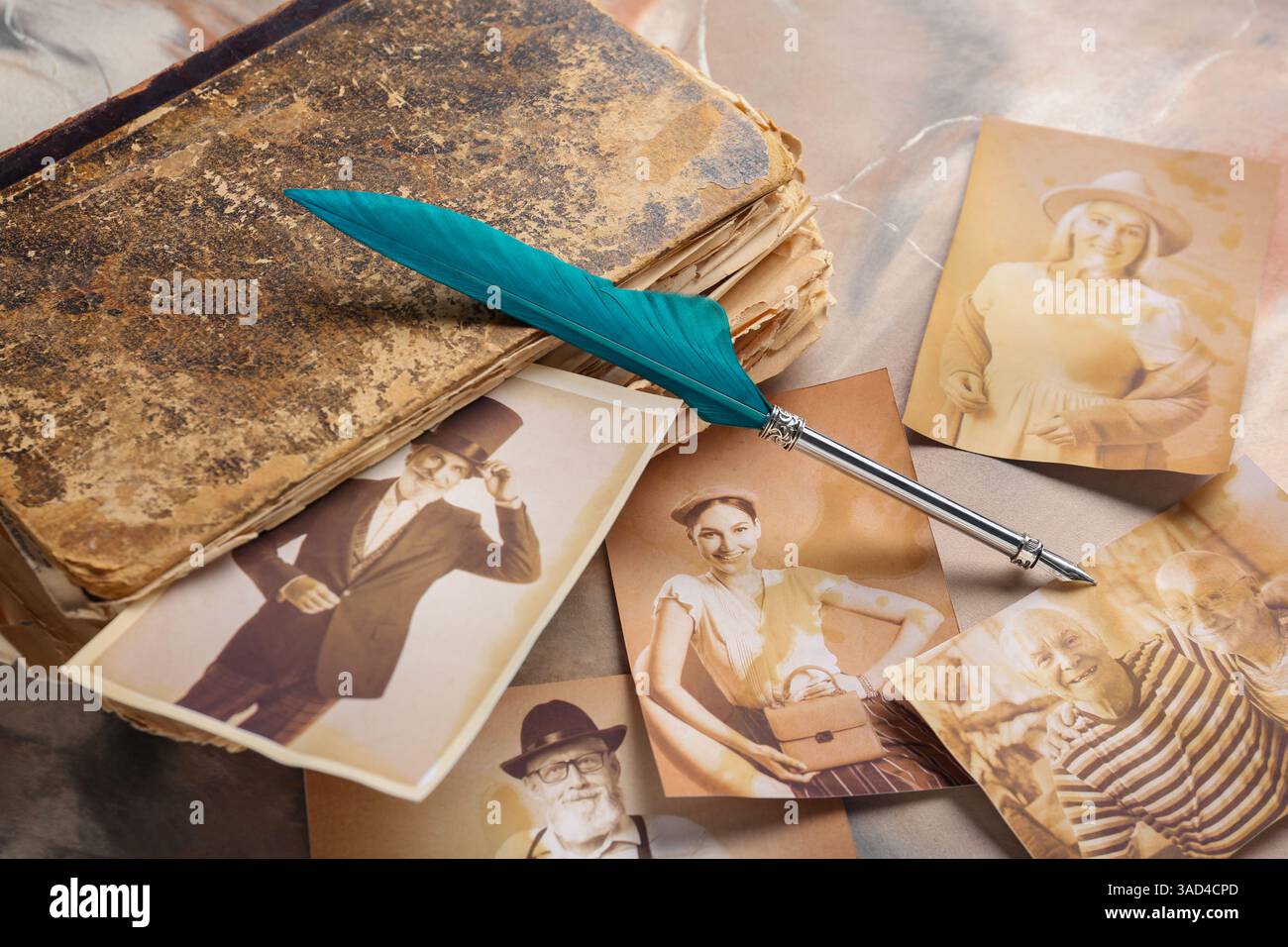 Old album with photos of relatives and pen on grunge background ...