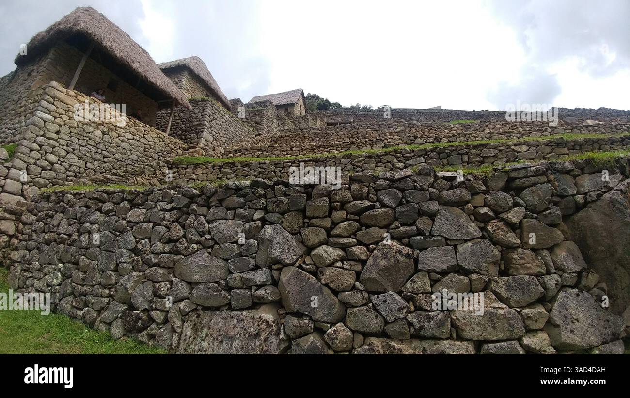 The buildings in Machu Picchu, Peru built with granite blocks, weigh ...