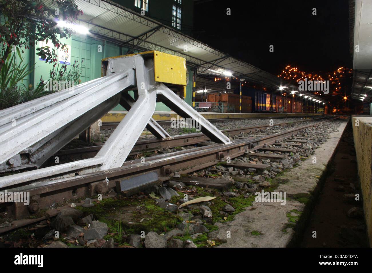 Tracks of the train station alone at night in Cusco Peru Stock Photo ...
