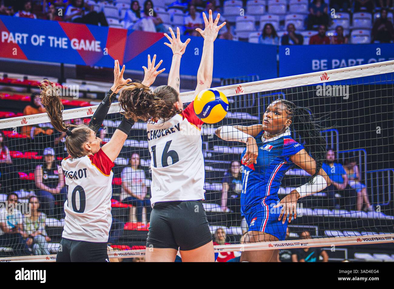 Volleyball players from France and the Germany in action during the ...