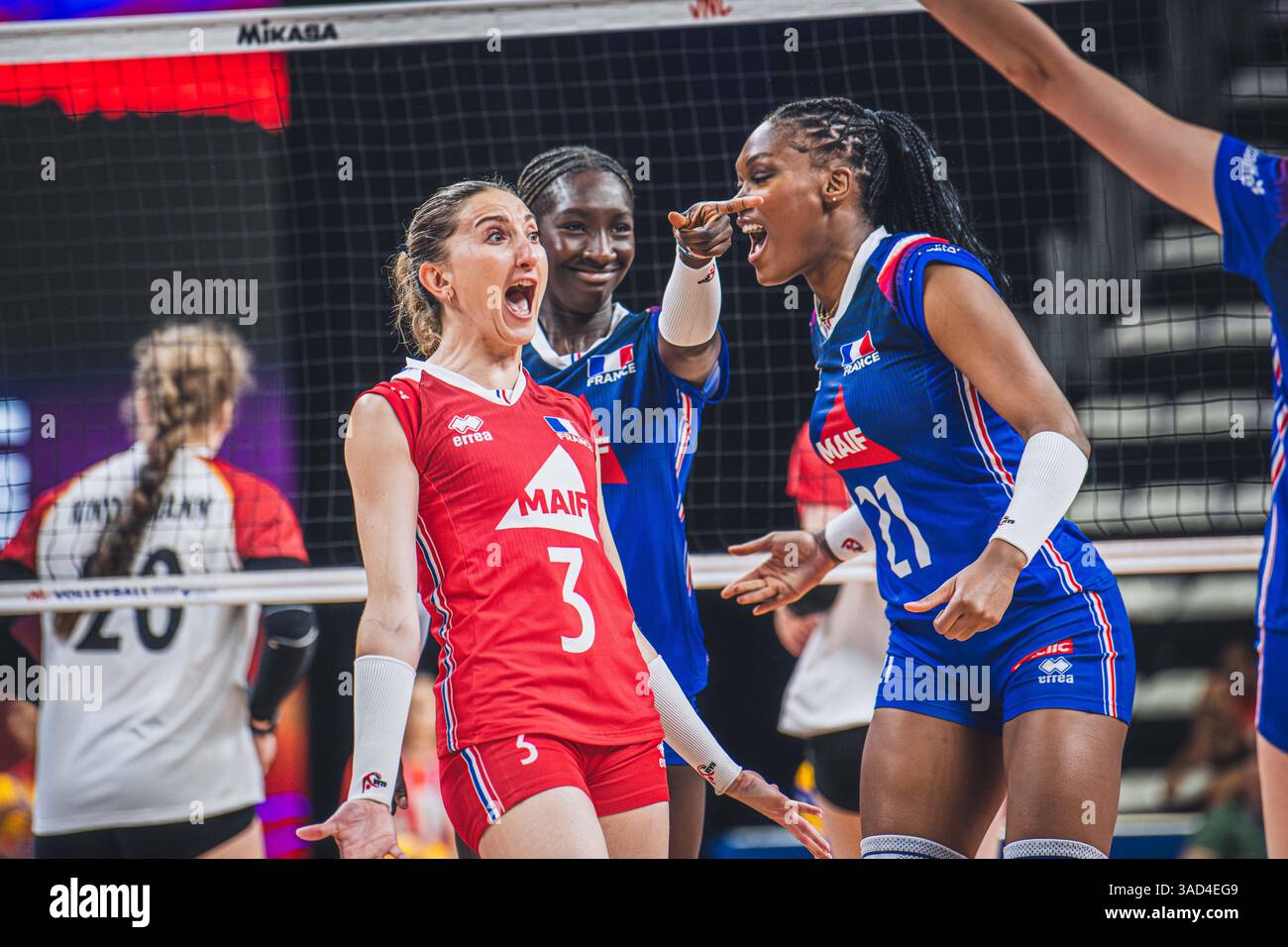 Volleyball players from France and the Germany in action during the ...