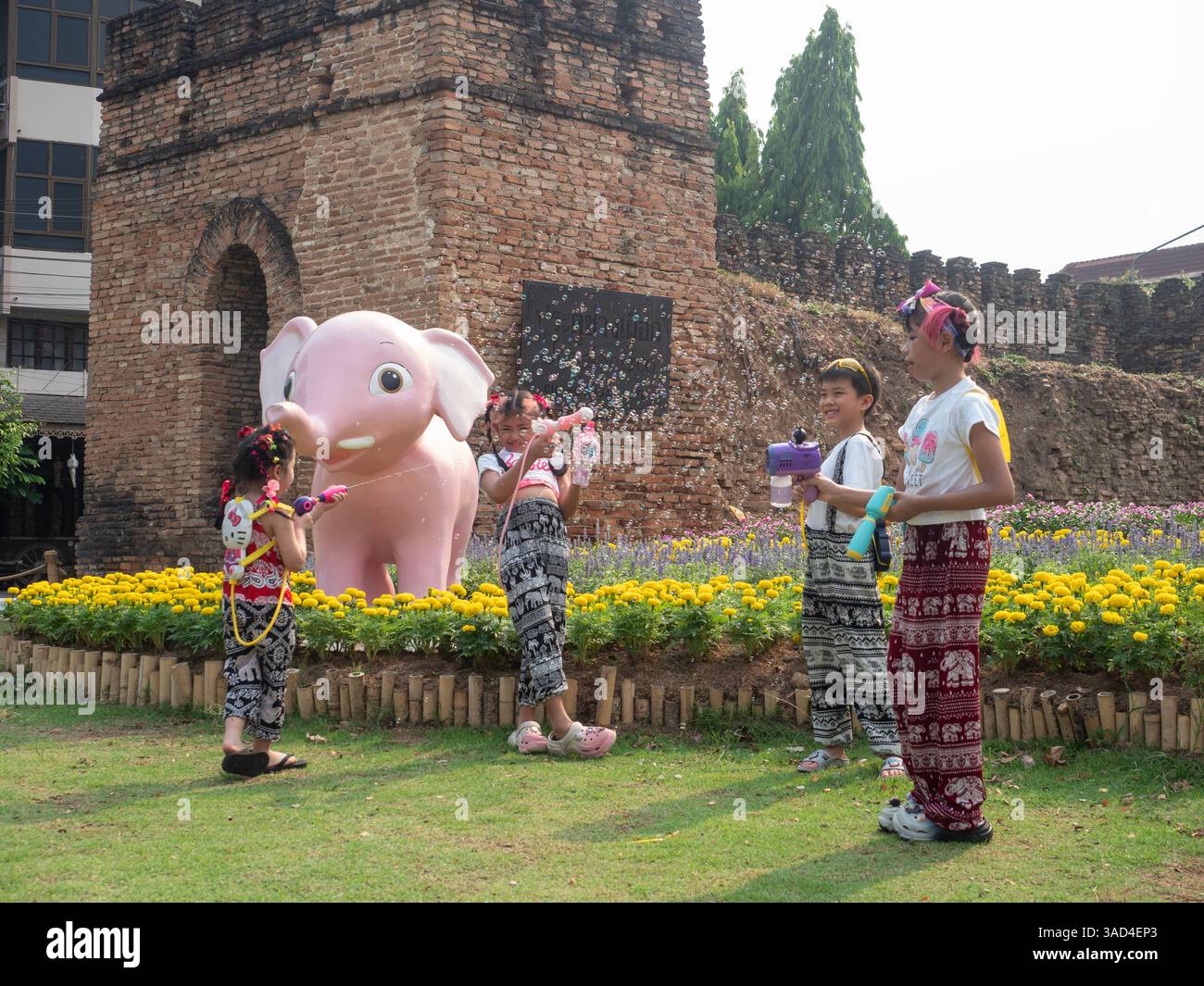 CHIANG MAI, THAILAND - APRIL 4, 2025 : Children and parents play with ...