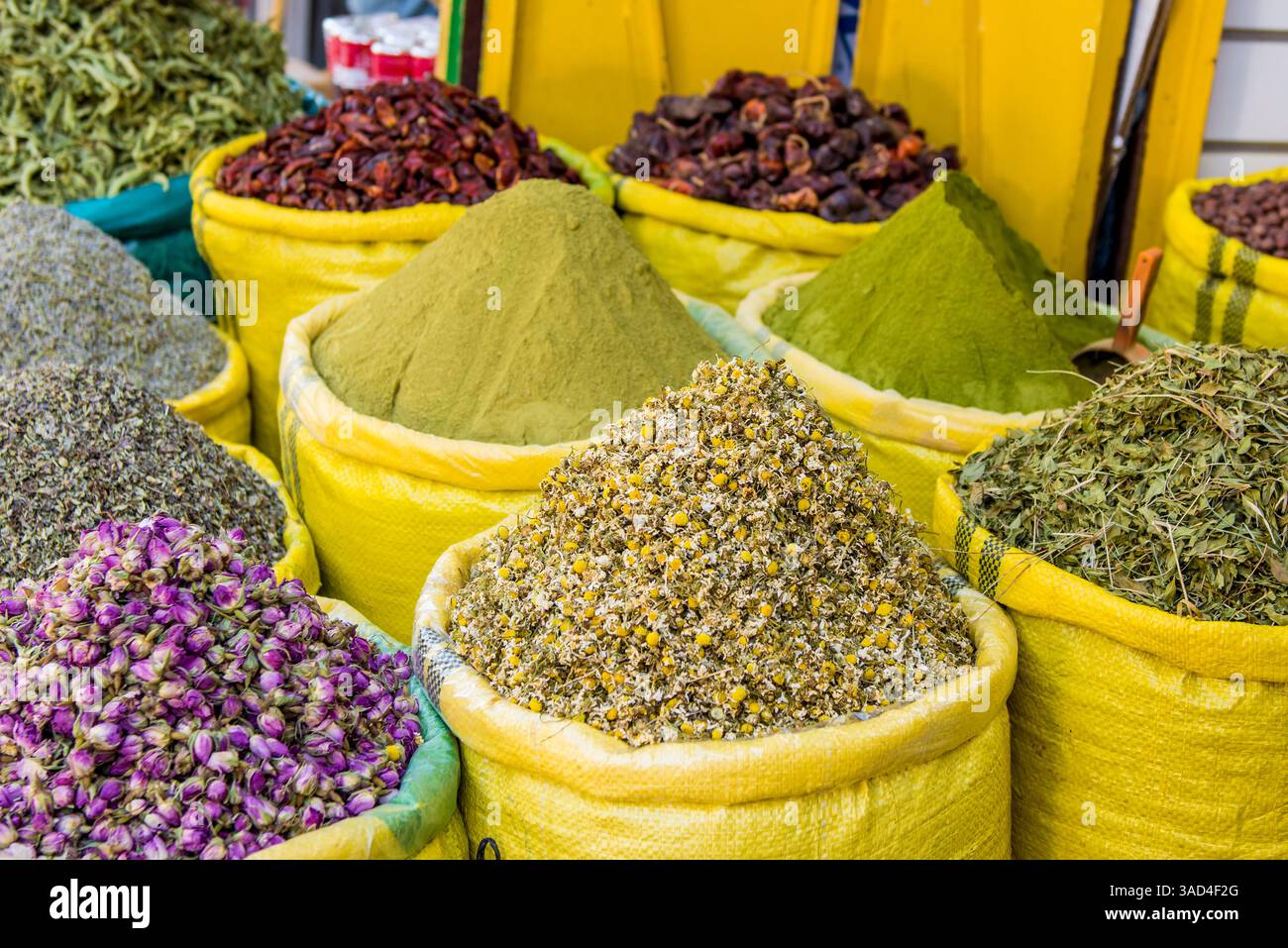 Spices and dry goods in the shops along narrow cobblestone streets of ...