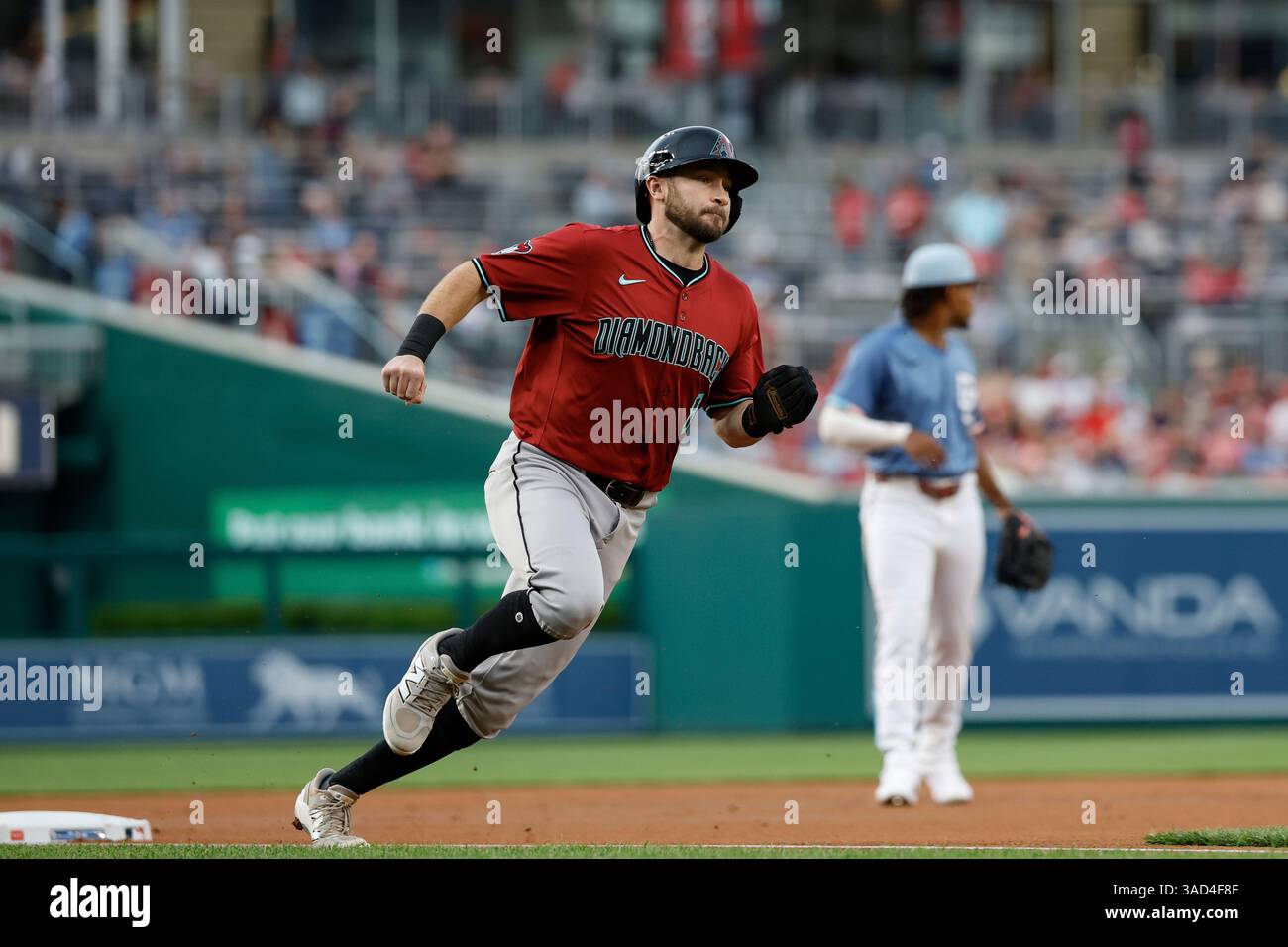 Arizona Diamondbacks Garrett Hampson runs on his way to scoring on a ...