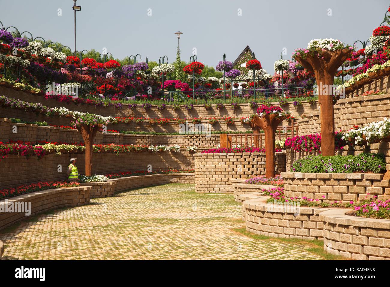 The Hanging gardens with beautiful colorful flowers on a wall inside ...