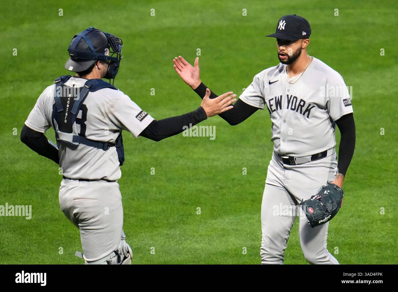 New York Yankees pitcher Devin Williams, right, celebrates with catcher ...