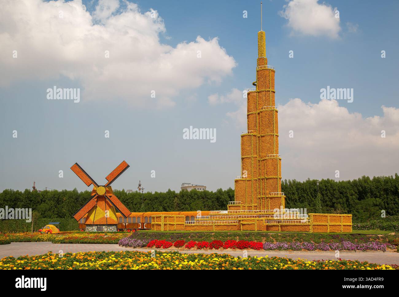 The Floral Burj Khalifa skyscraper, a windmill with beautiful colorful ...