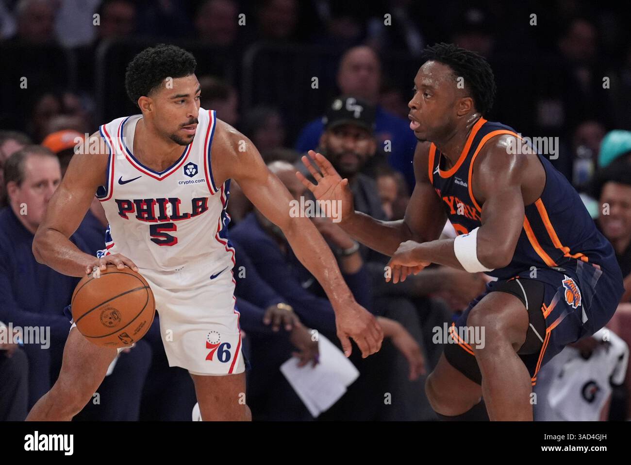 New York Knicks' OG Anunoby, right, defends Philadelphia 76ers' Quentin Grimes (5) during the ...
