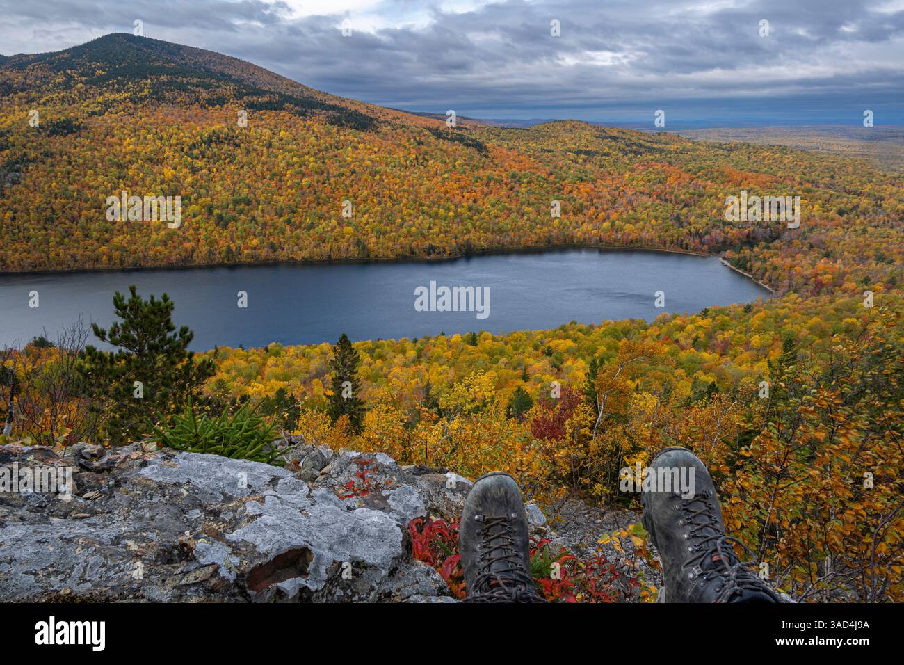 USA, Maine. Fall foliage and view of South Branch Pond from Traveler ...