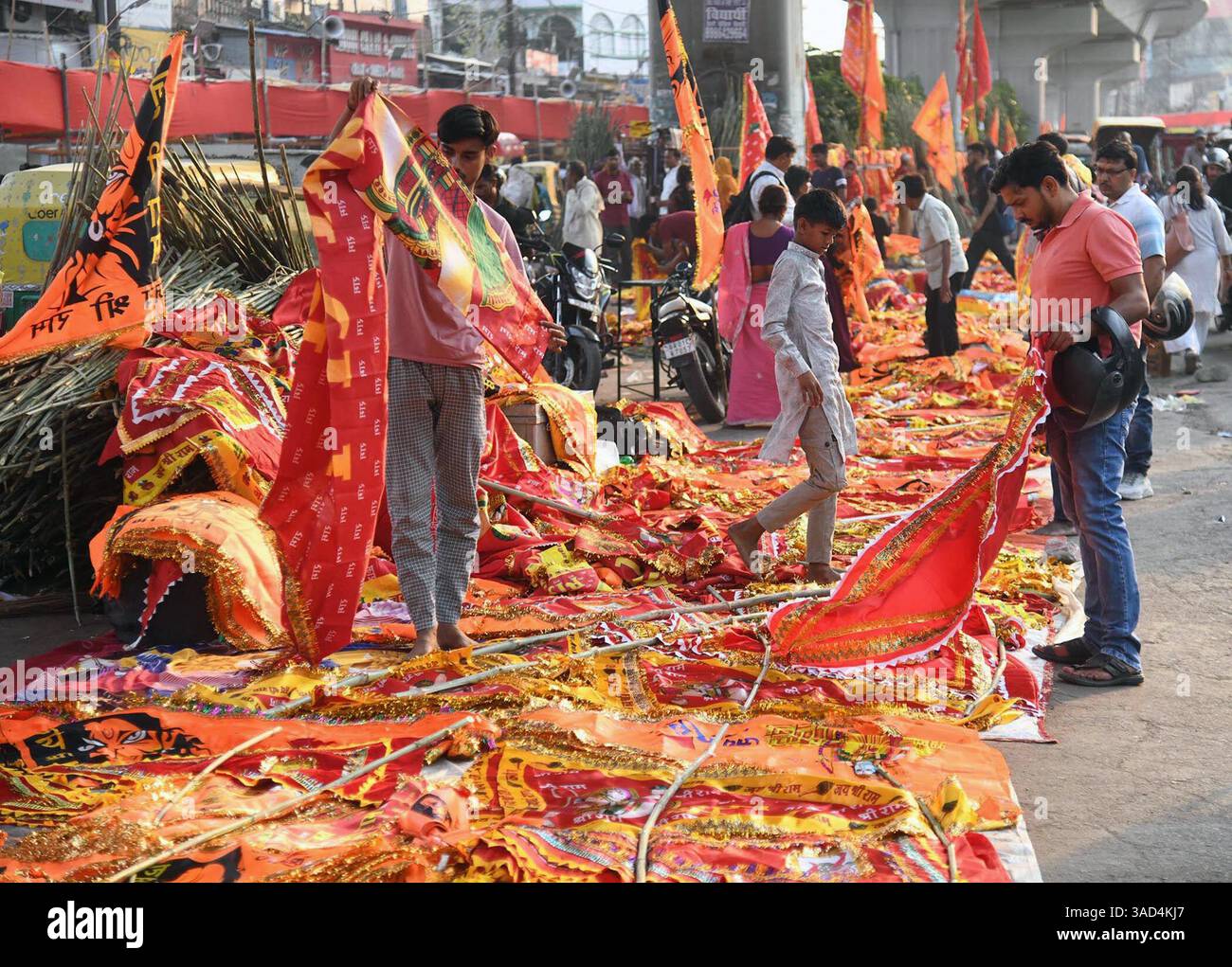 PATNA, INDIA - APRIL 4: People buying religous flags on road side ahead ...