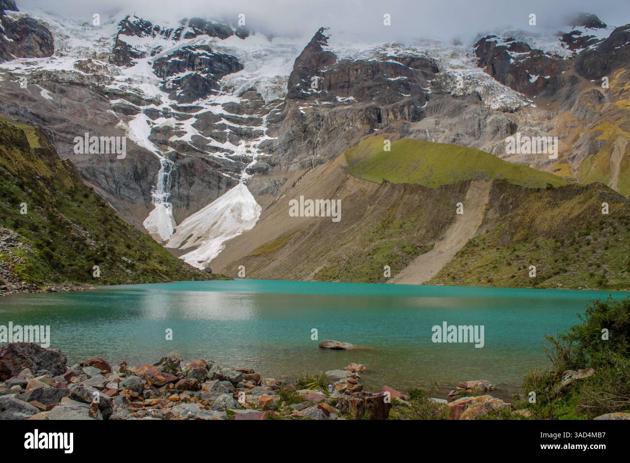 Salkantay mountain and lake on a trek to Machu Picchu in the Andes ...