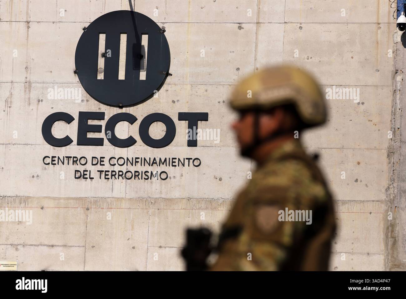 A soldier stands guard at the Terrorist Confinement Center in Tecoluca ...