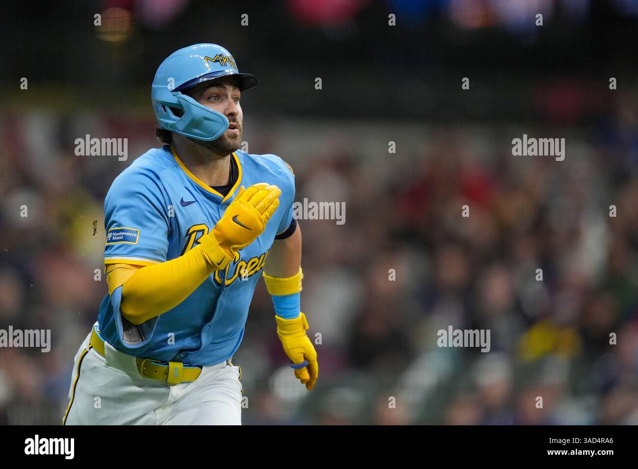 Milwaukee Brewers' Garrett Mitchell runs the bases after hitting a ...