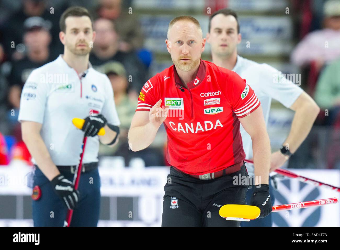 Canada skip Brad Jacobs, front right, watches his stone as United ...