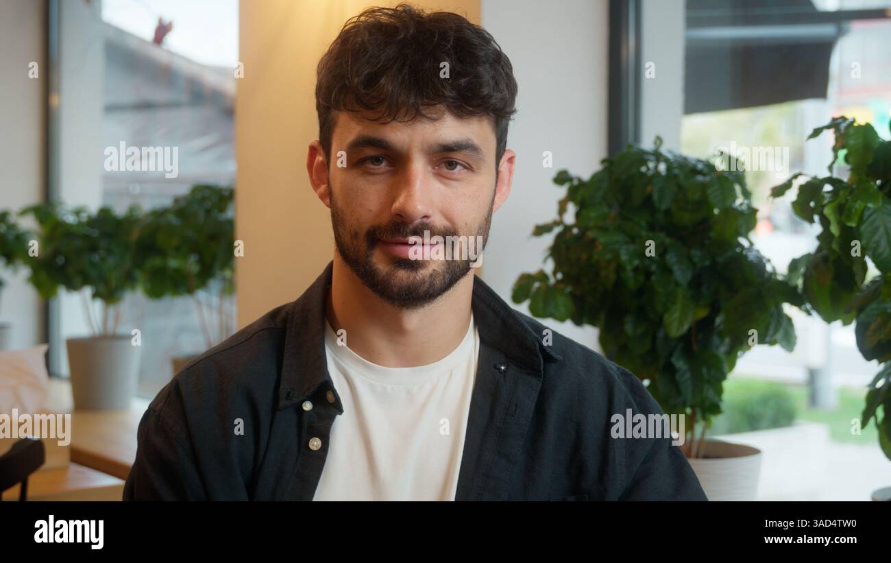 Caucasian man using mobile phone smartphone laptop working online male ...