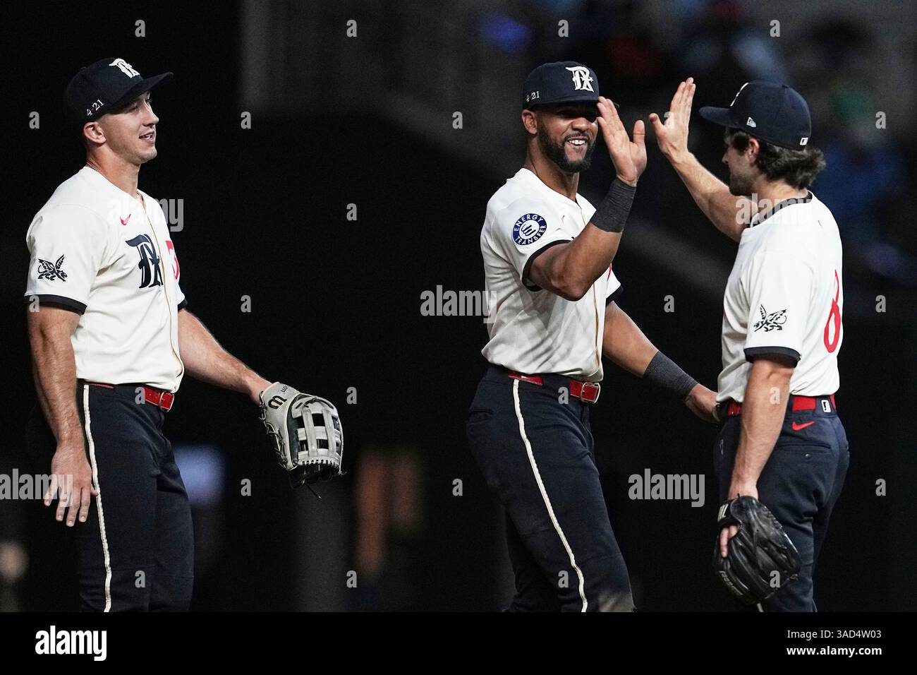 From left to right, Texas Rangers' Wyatt Langford, Leody Taveras and ...