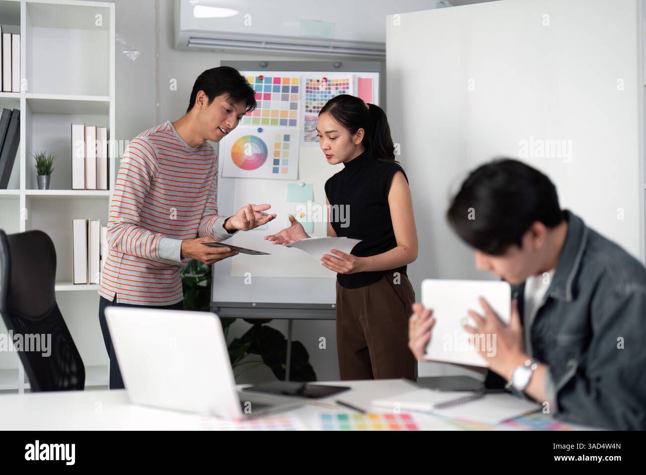 Ideation and Visual Strategy. Designers collaborating on visual ...