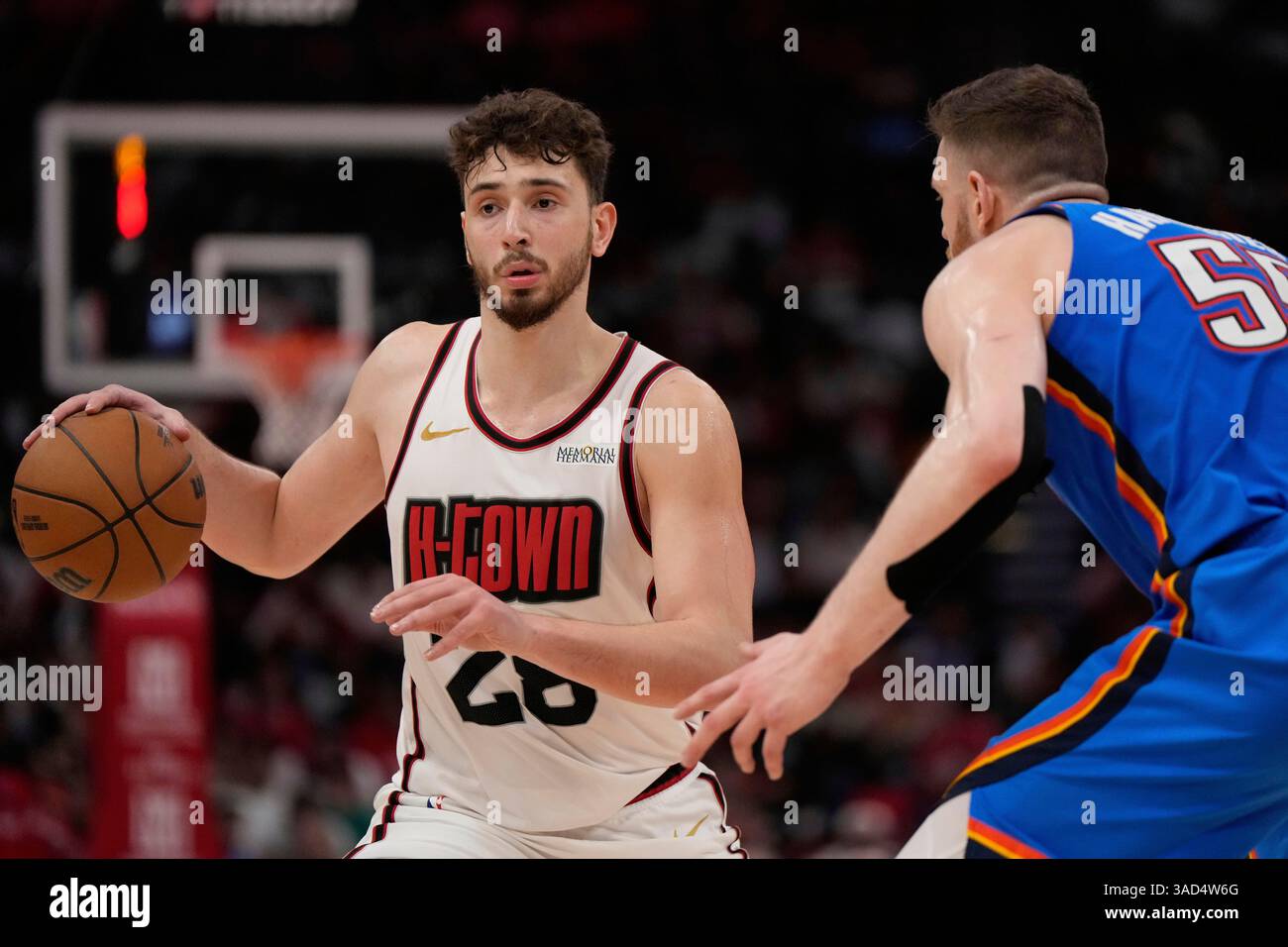 Houston Rockets center Alperen Sengun (28) controls the ball against ...