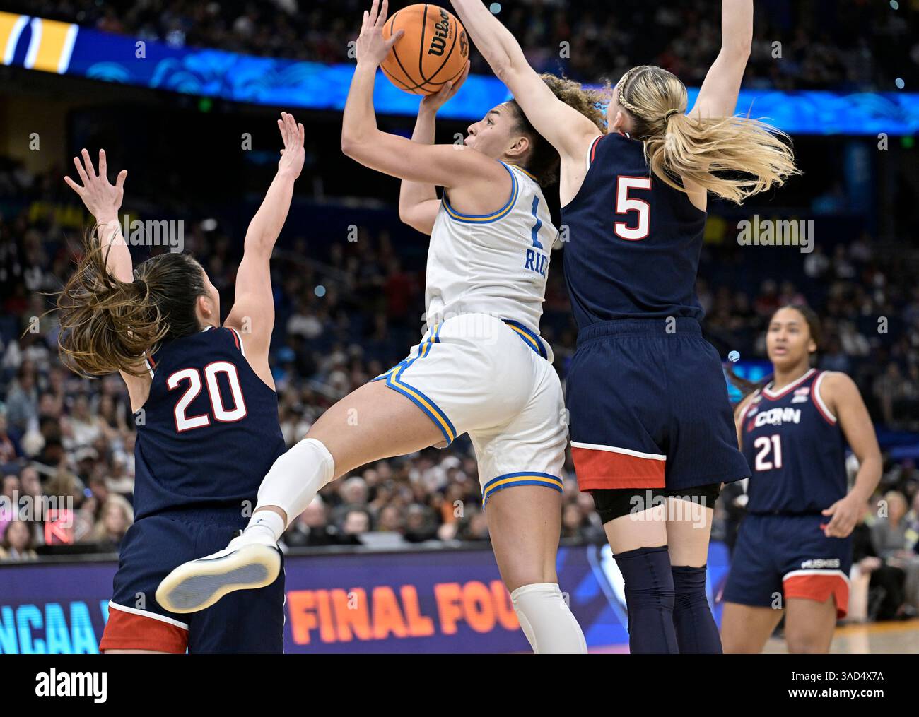 Tampa, United States. 04th Apr, 2025. UCLA guard Kiki Rice (1) shoots ...