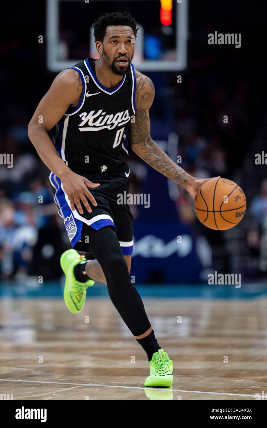 Sacramento Kings guard Malik Monk (0) brings the ball up court against ...