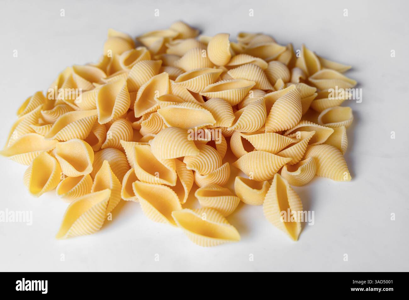Uncooked penne tagliatelle copy hi-res stock photography and images - Alamy