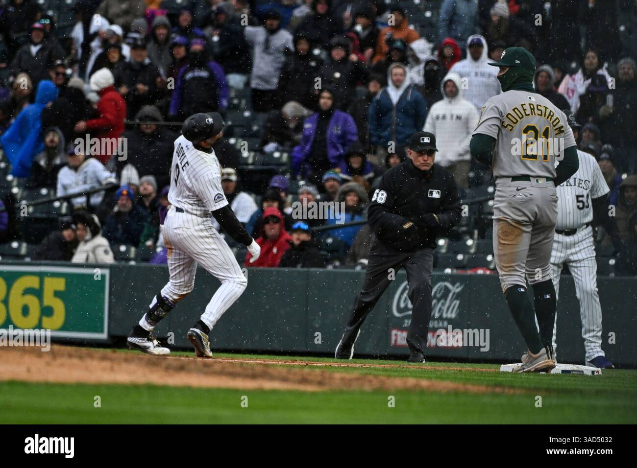 Colorado Rockies' Brenton Doyle (9) reacts after being called out at ...
