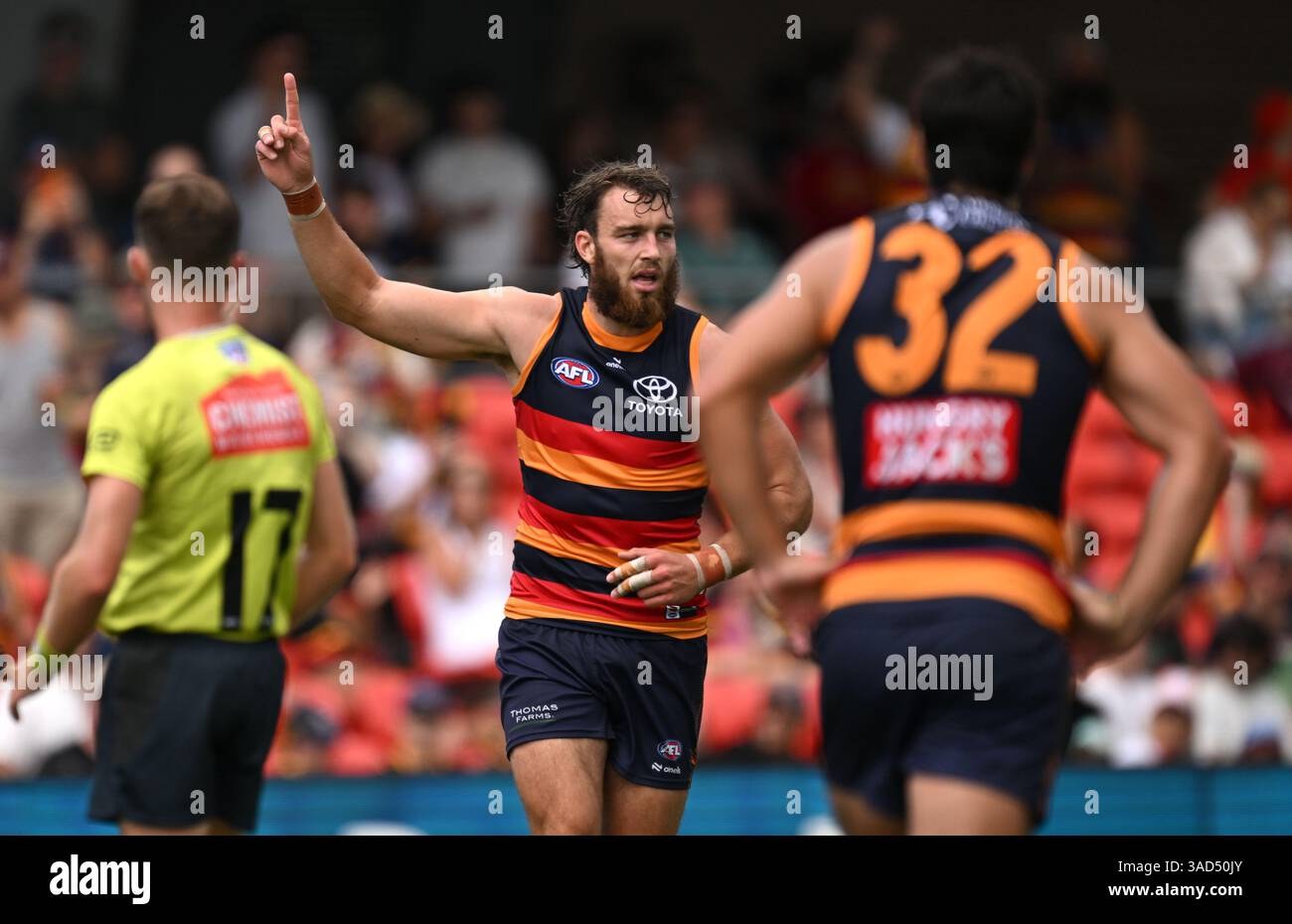 Riley Thilthorpe of the Crows reacts after kicking a goal during the ...