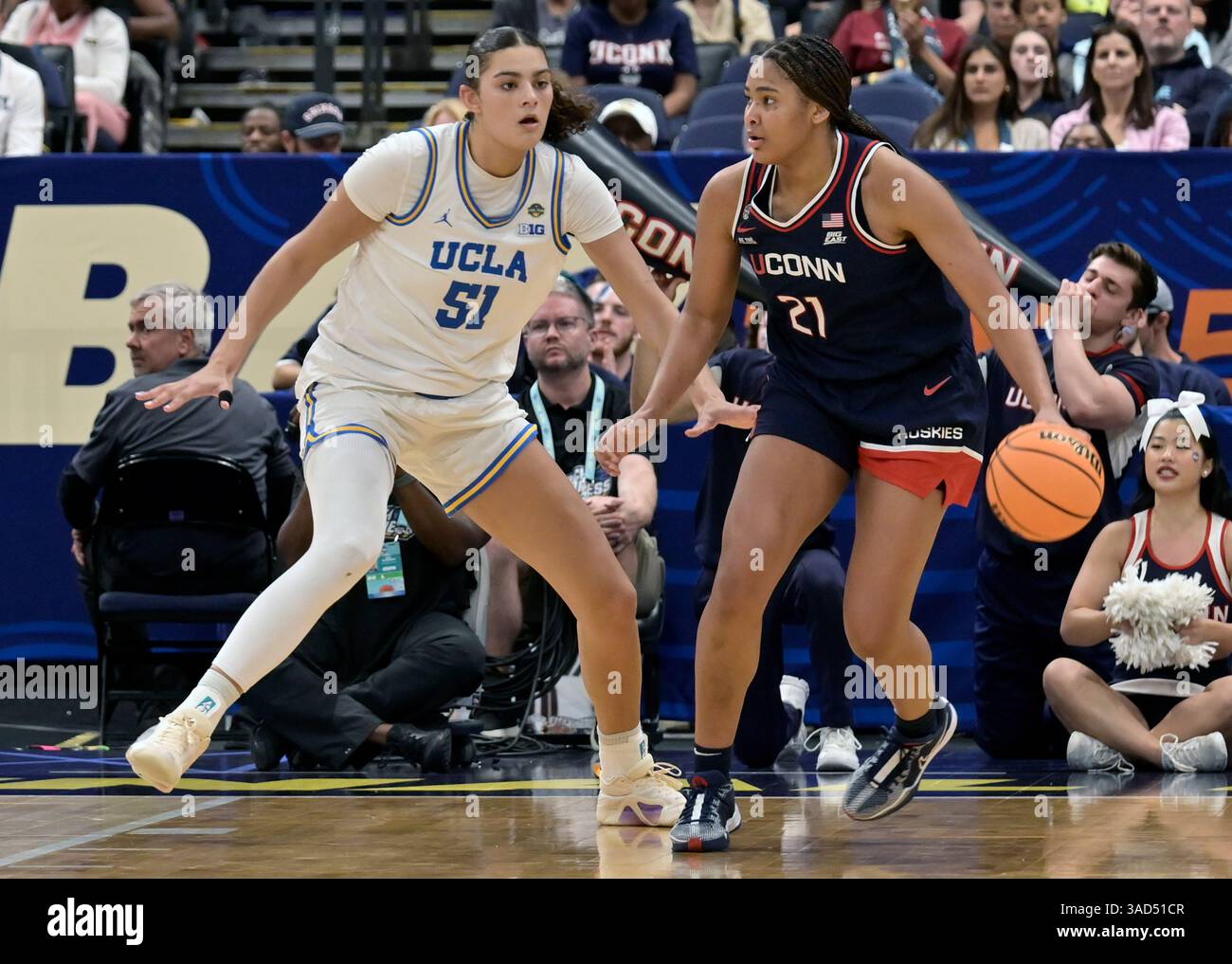 UConn forward Sarah Strong (21) is guarded by UCLA center Lauren Betts ...
