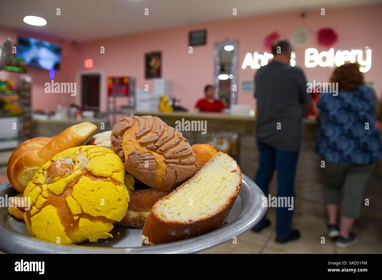 Customers visit Abby's Bakery in Los Fresnos, Texas, after the owners ...