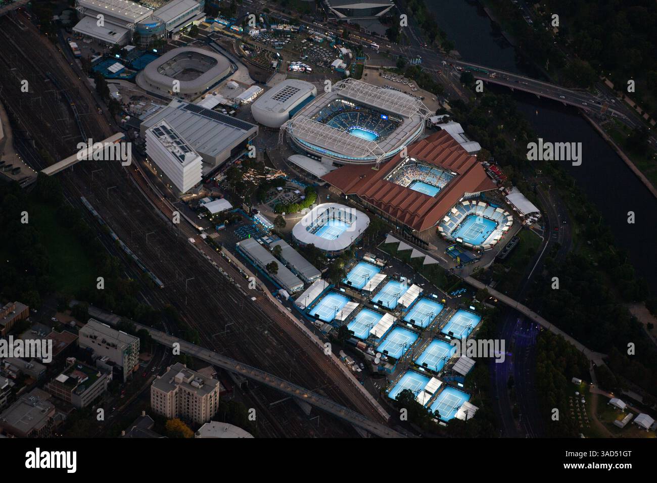 Aerial view of the Olympic Park Precinct lit up at dusk during the ...