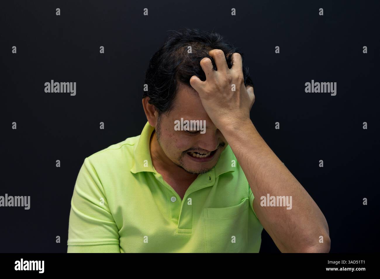 Anxious asian short hair man feeling sadness and stress Stock Photo - Alamy