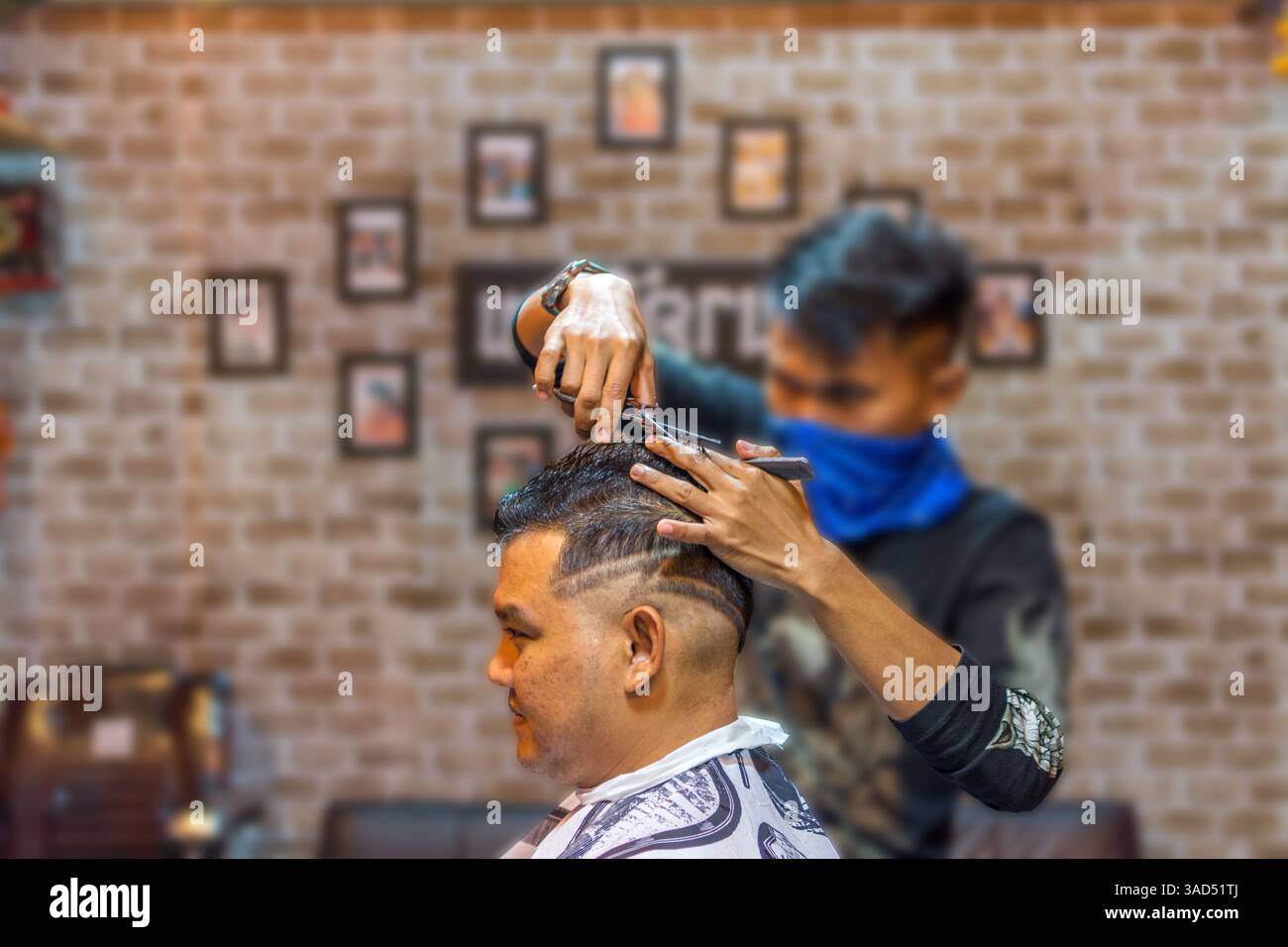 Thai man barber haircut a man customer in fashion vintage hairstyle at ...