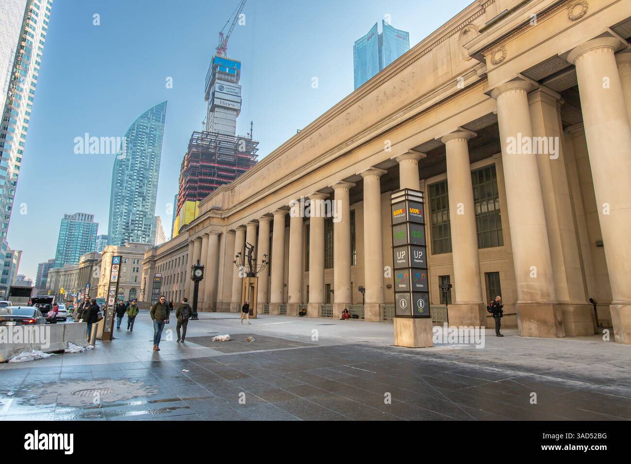 Daytime street view of Union Station in Toronto with iconic columns ...