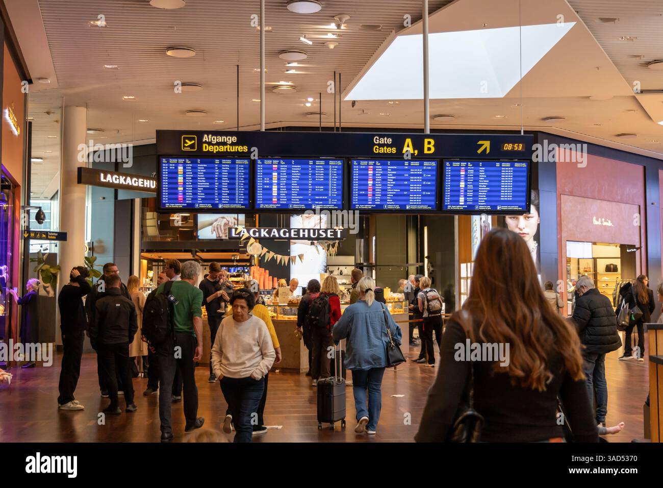 Copenhagen International Airport information board with flight ...