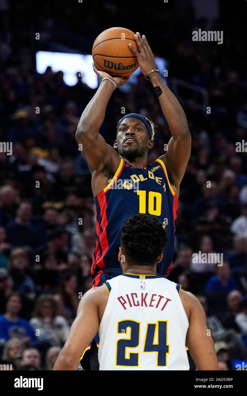 Golden State Warriors forward Jimmy Butler III (10) shoots over Denver ...