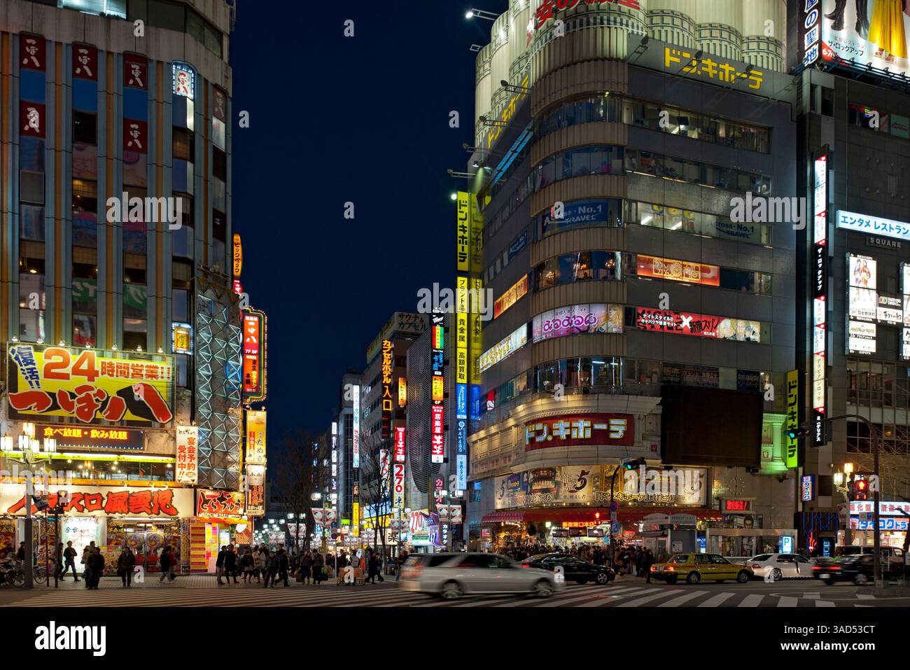Kabukicho building facades glow in the night with neon signs, the ...