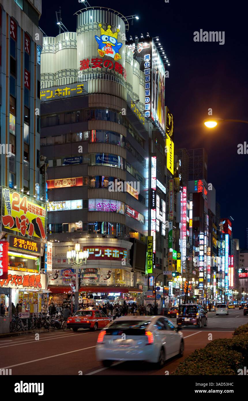 Kabukicho building facades glow in the night with neon signs, the ...