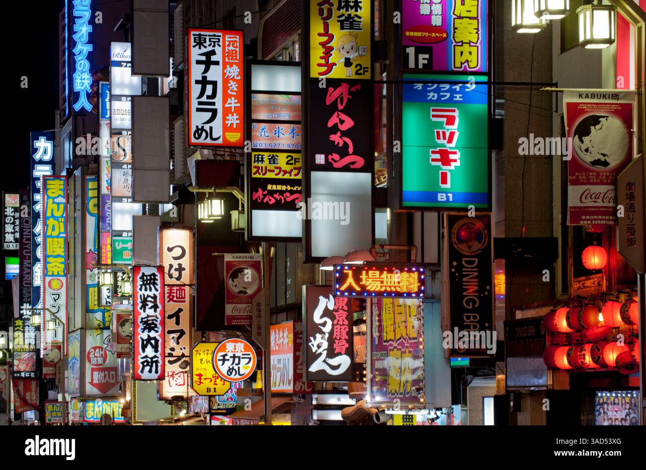 Kabukicho building facades glow in the night with neon signs, the ...