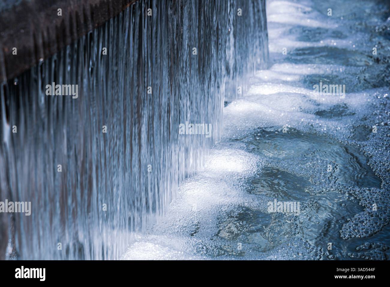 Part of the beautiful and big water fountain. Background with flowing ...