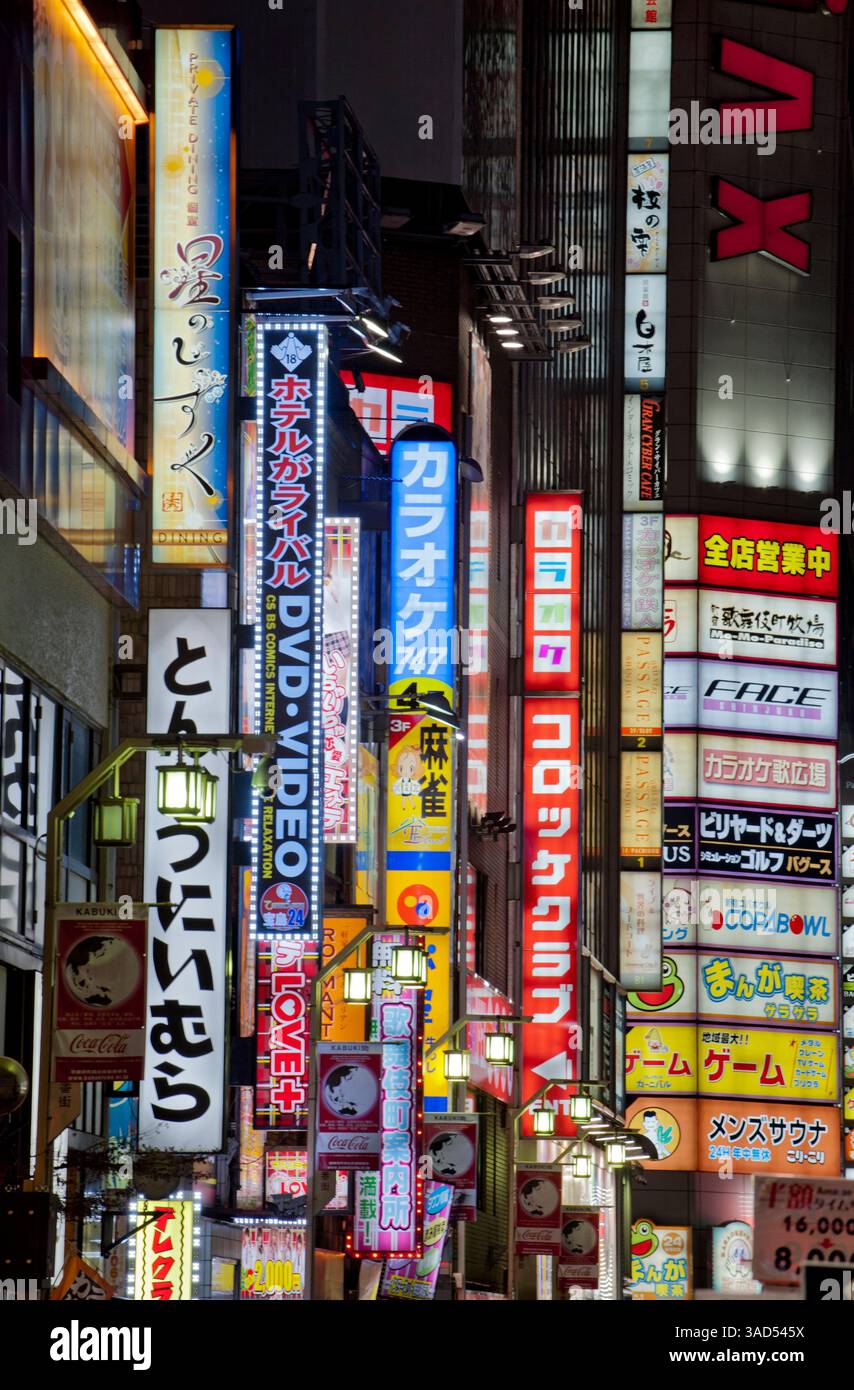 Kabukicho building facades glow in the night with neon signs, the ...